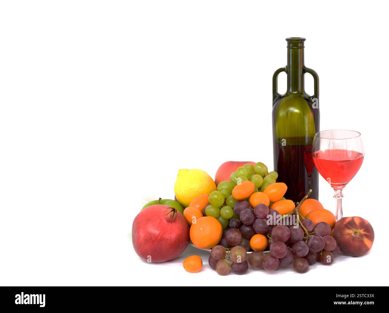 Bright still life with wine and fruit Stock Photo - Alamy