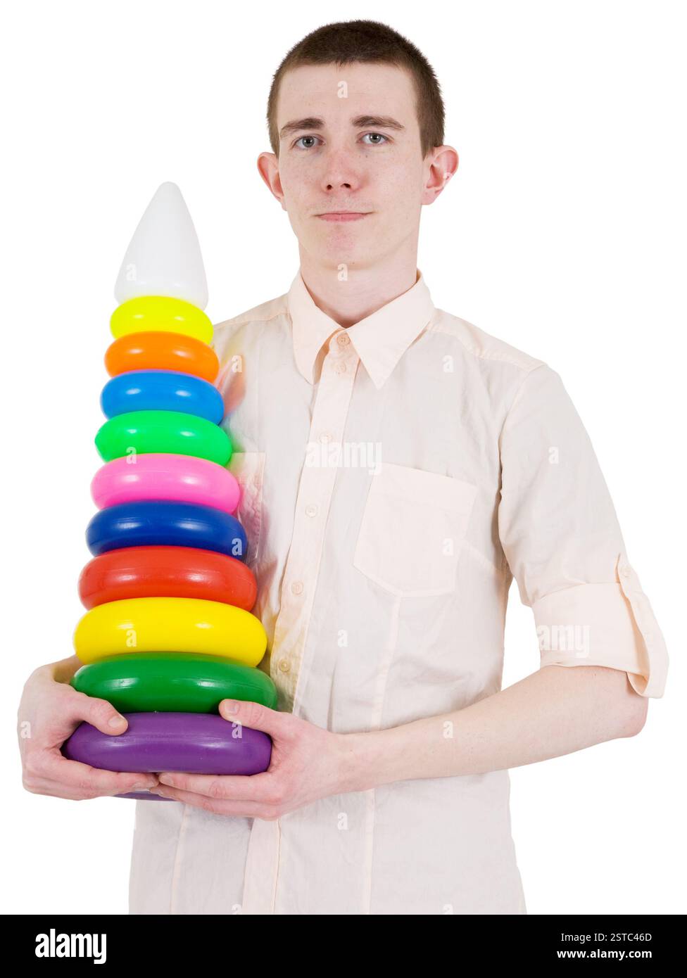Young man and toy pyramid Stock Photo - Alamy