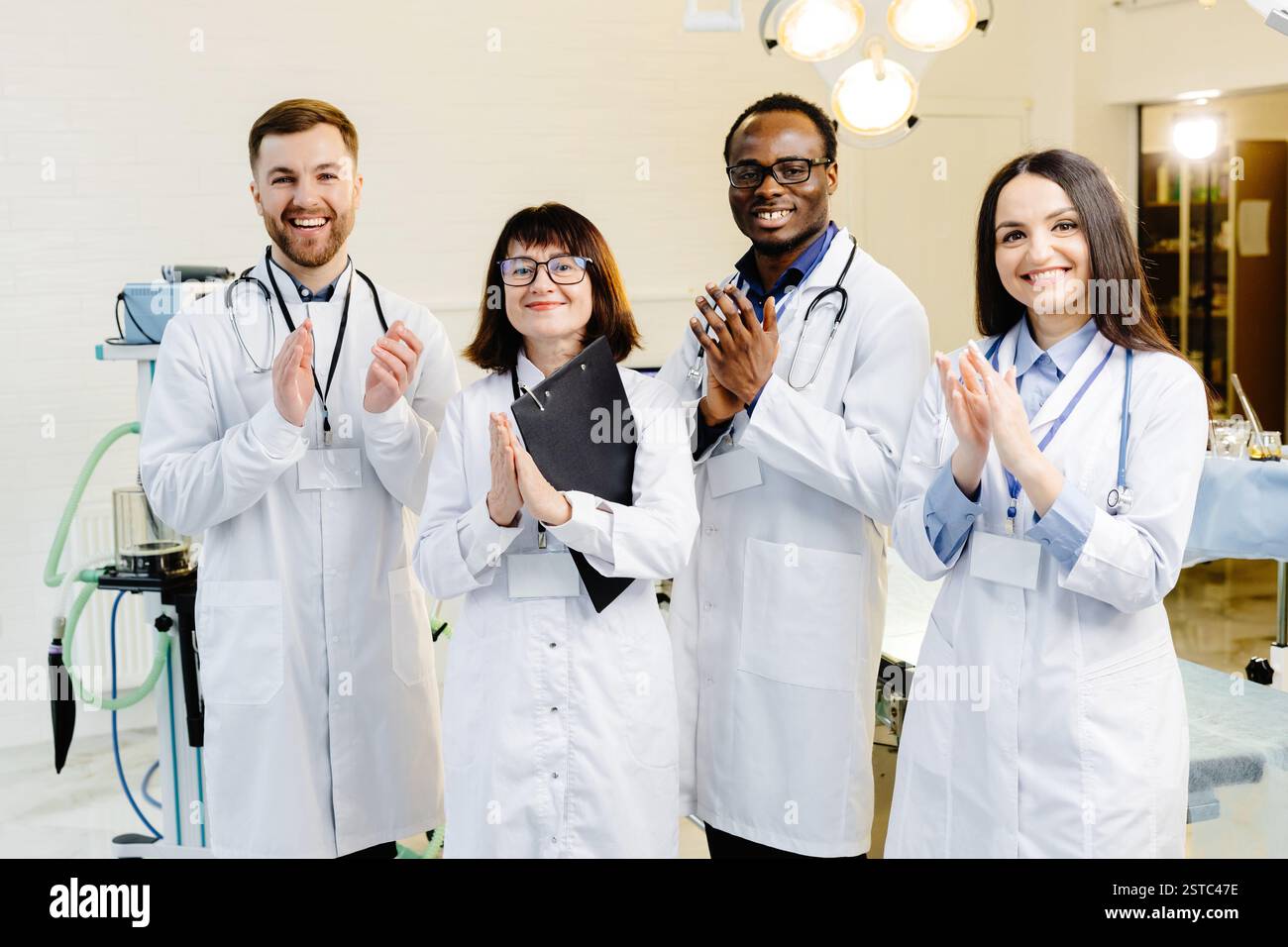 Group of doctors standing together Stock Photo - Alamy