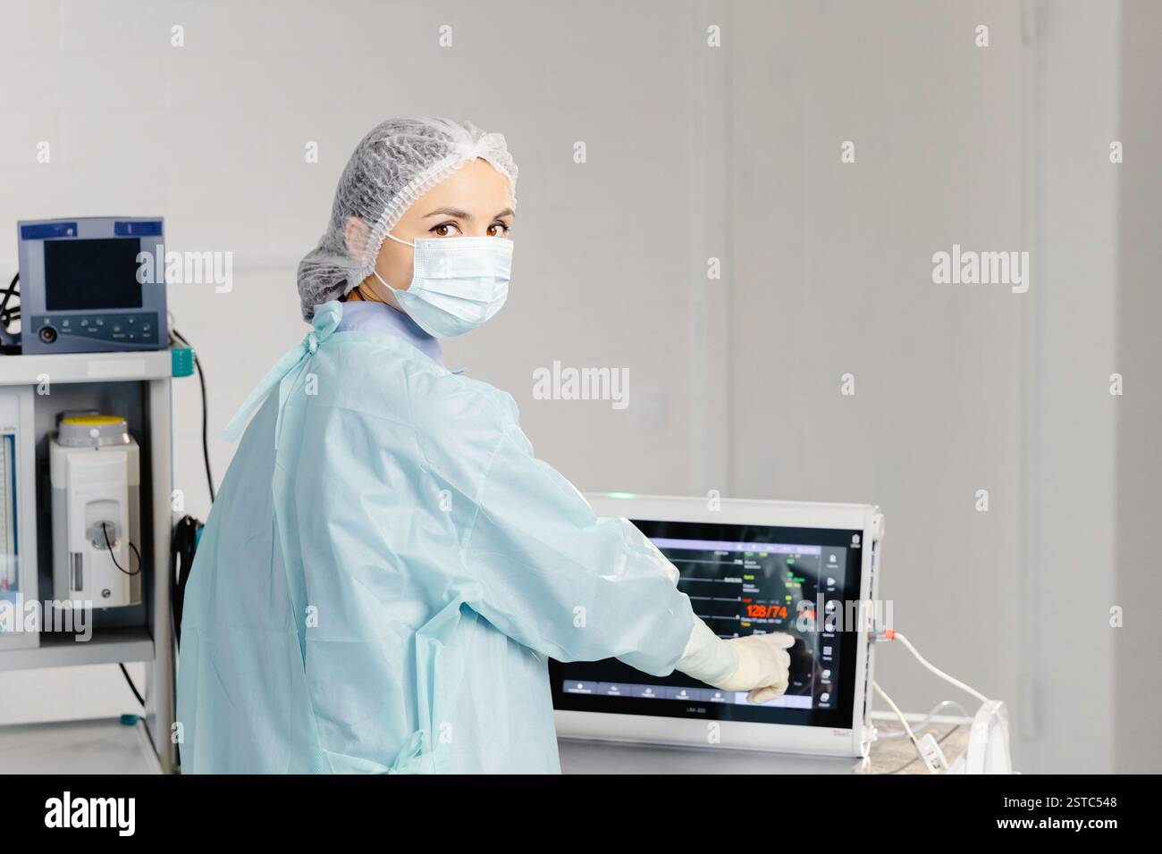 Operating room gown hi-res stock photography and images - Alamy