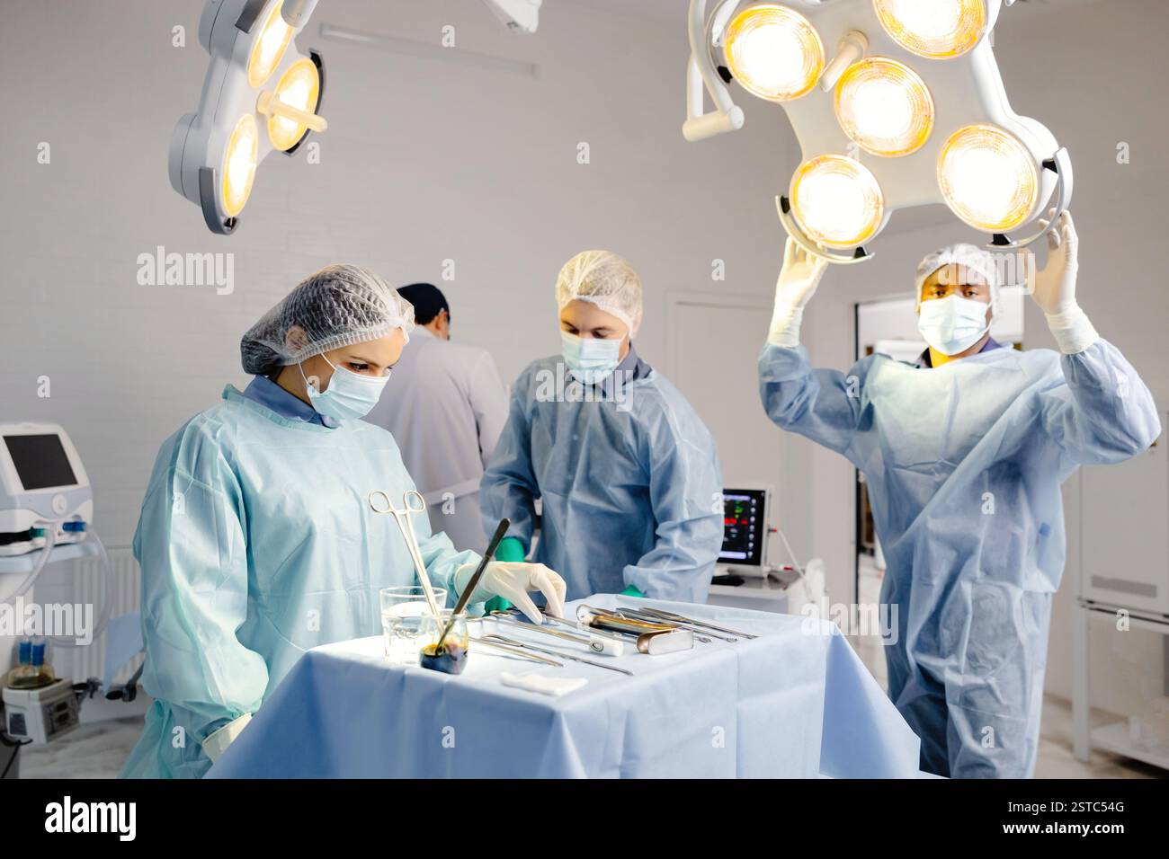 Focused surgeon performing surgical operation hi-res stock photography ...