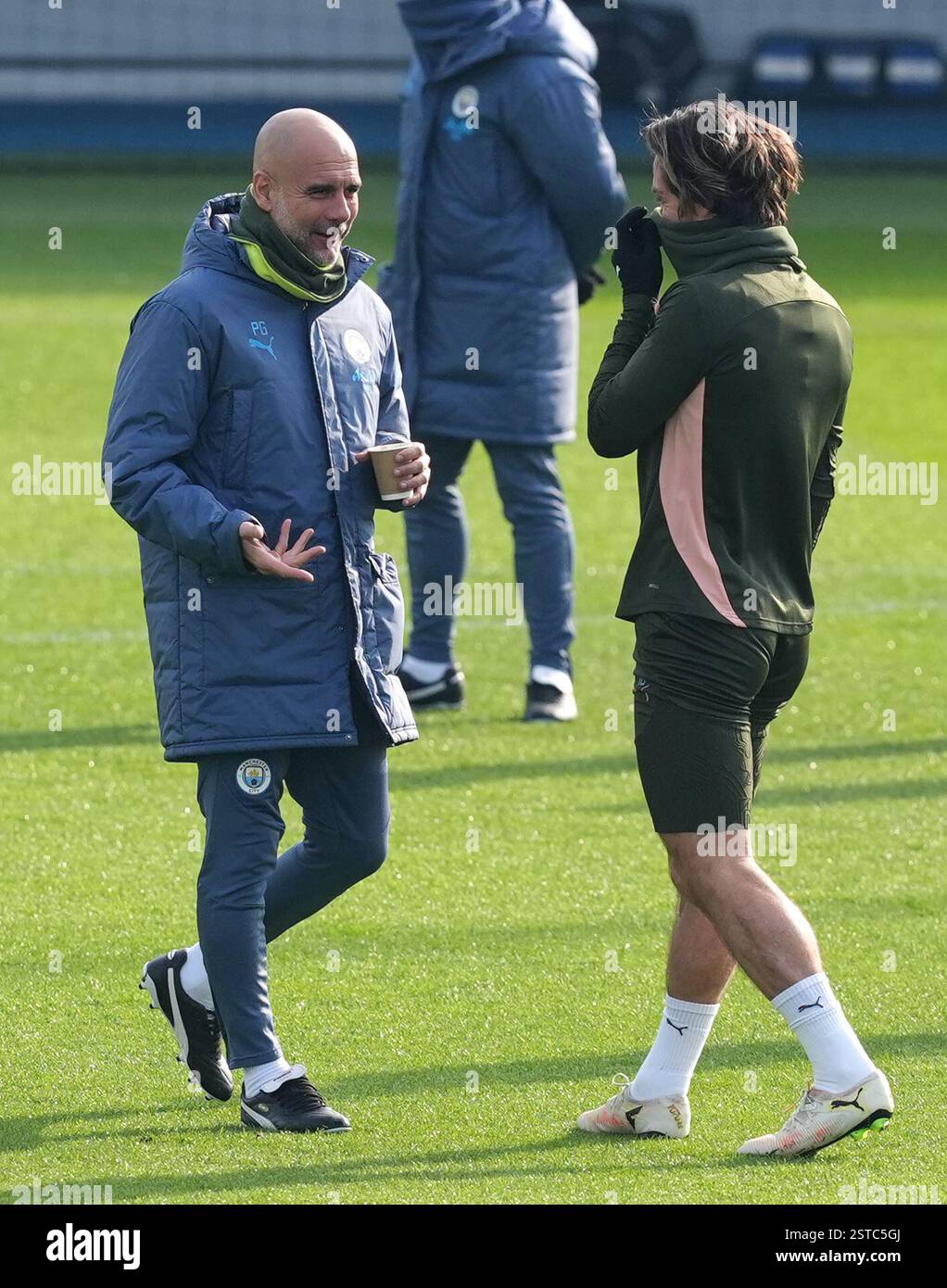 Manchester City manager Pep Guardiola with Jack Grealish during a ...