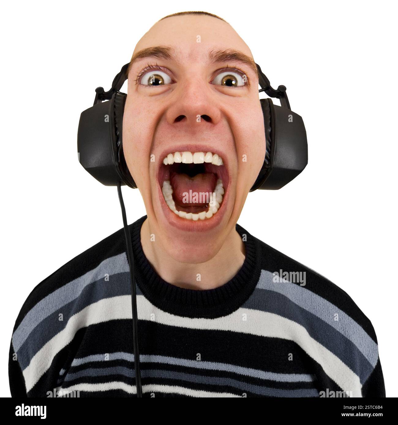 Funny man in stereo headphones shouting Stock Photo - Alamy