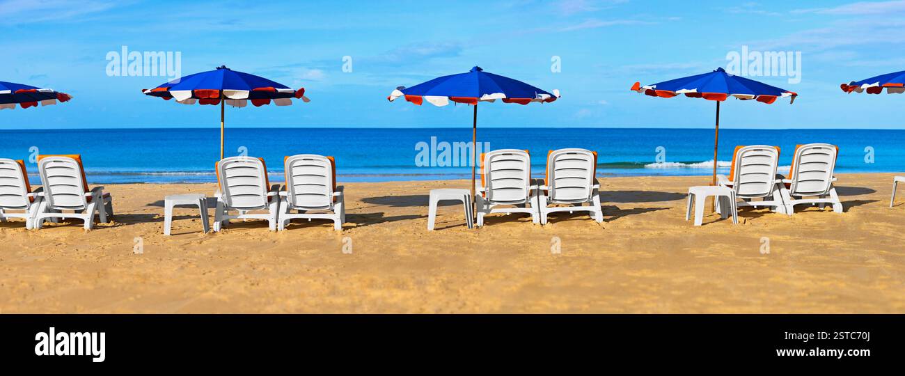Yellow sunbeds on beach hi-res stock photography and images - Alamy