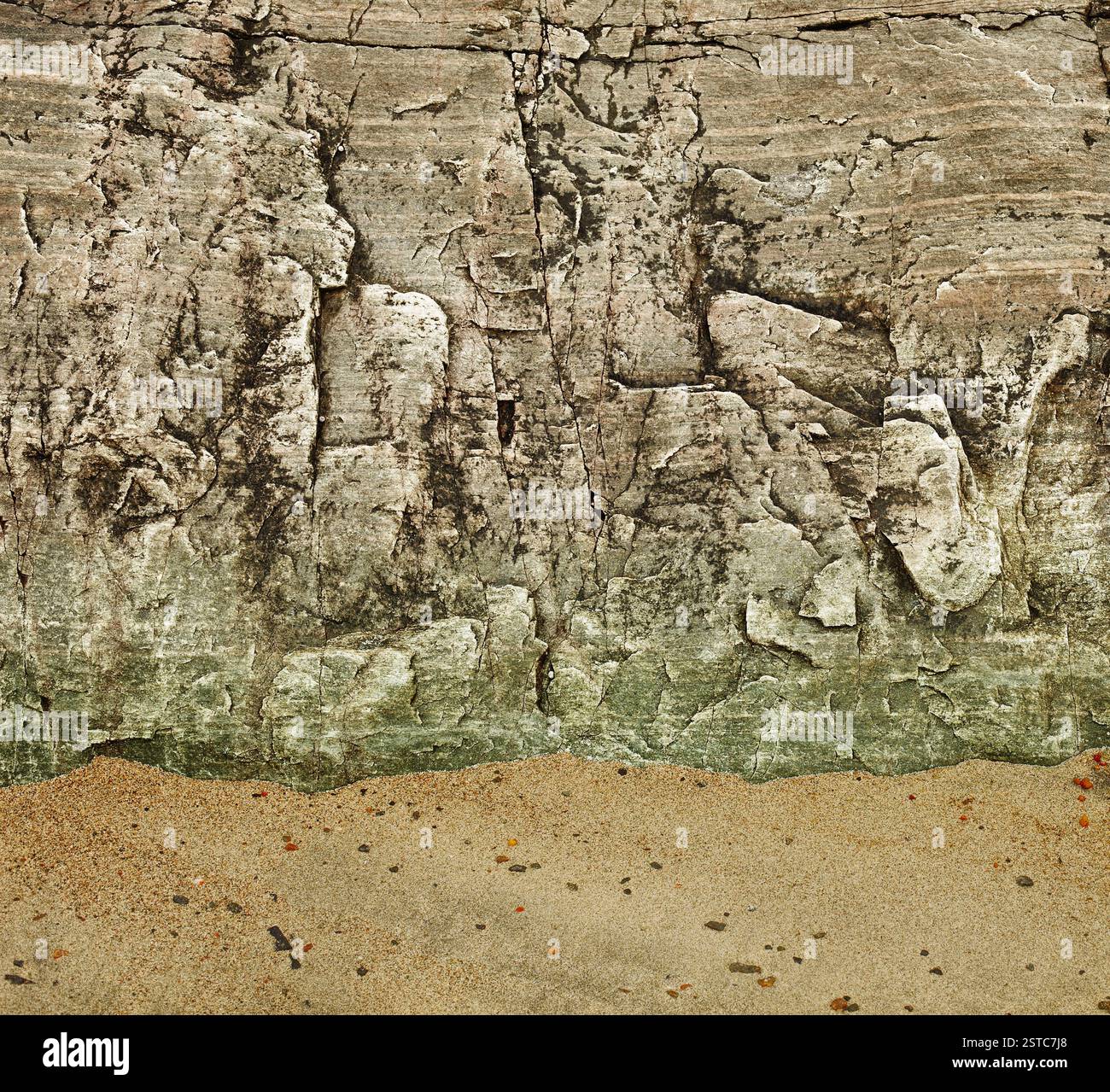 The granite rock on a sandy beach - background Stock Photo - Alamy