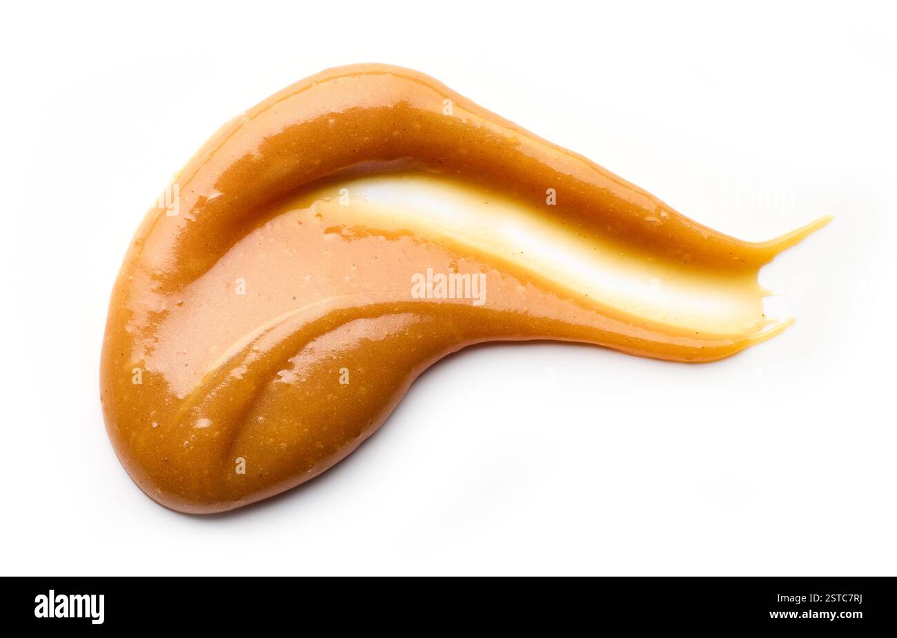 Smear of tasty caramel paste on white background, top view Stock Photo ...