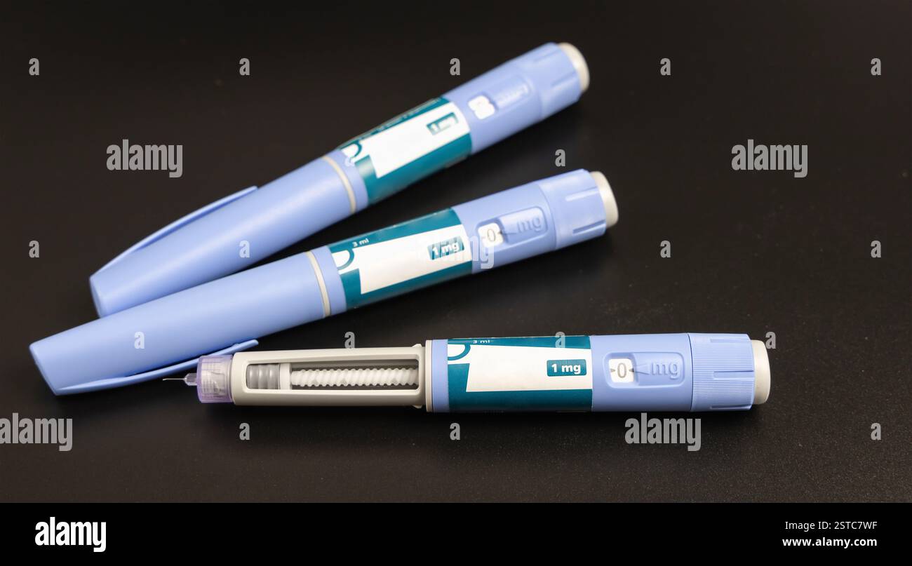 Ozempic Insulin injection pen on a dark background Stock Photo - Alamy