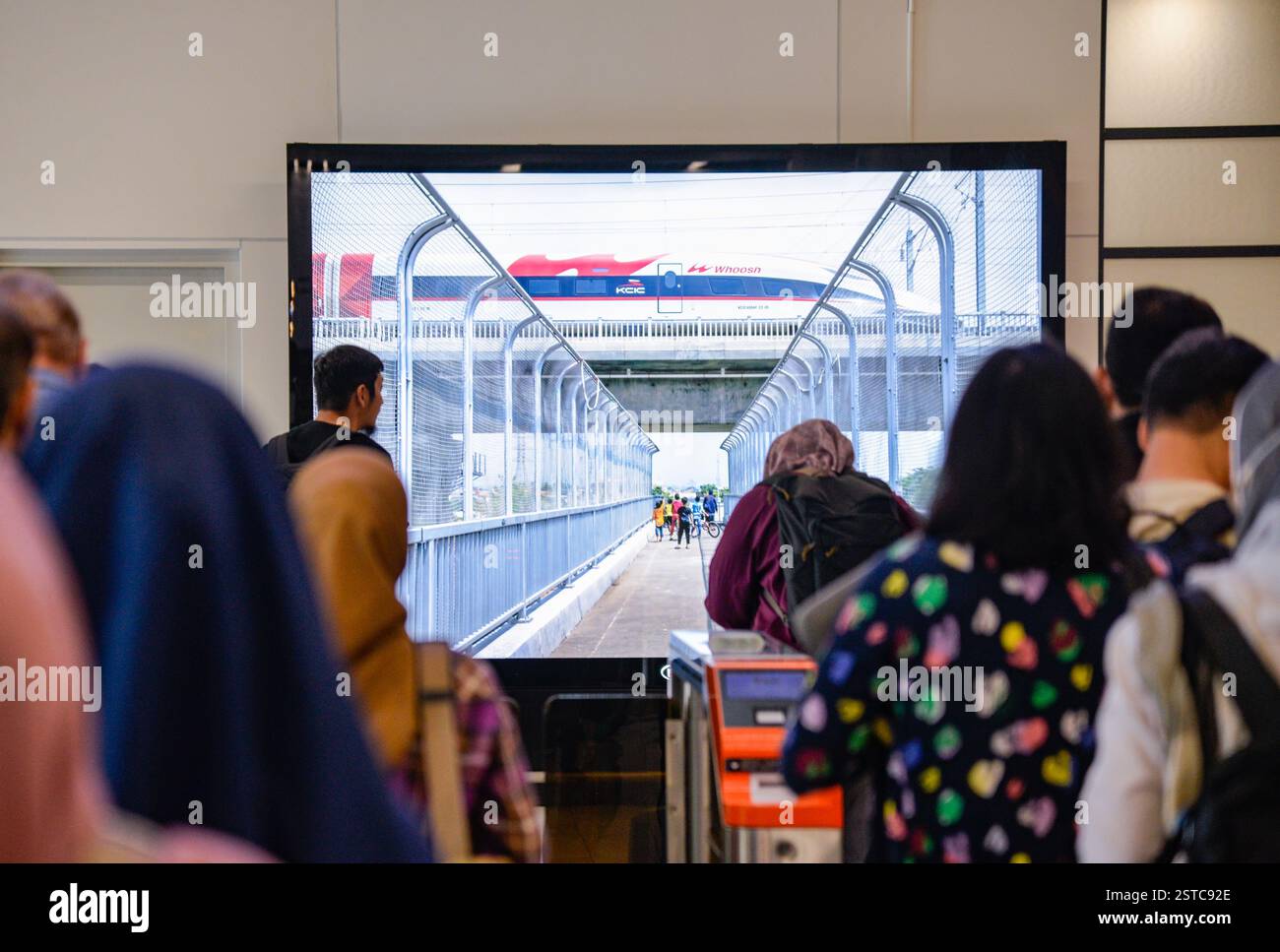 Jakarta, Indonesia. 17th Feb, 2025. Passengers check in at Halim Station of Jakarta-Bandung High ...