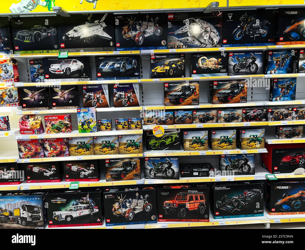 Lviv, Ukraine - February 16, 2025: Brightly lit store aisle filled with ...