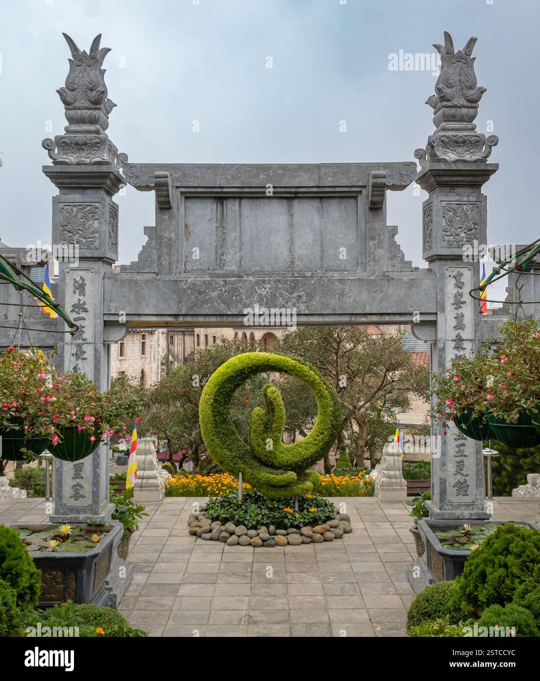 Stone traditional style gate structure at a Buddhist temple garden at ...