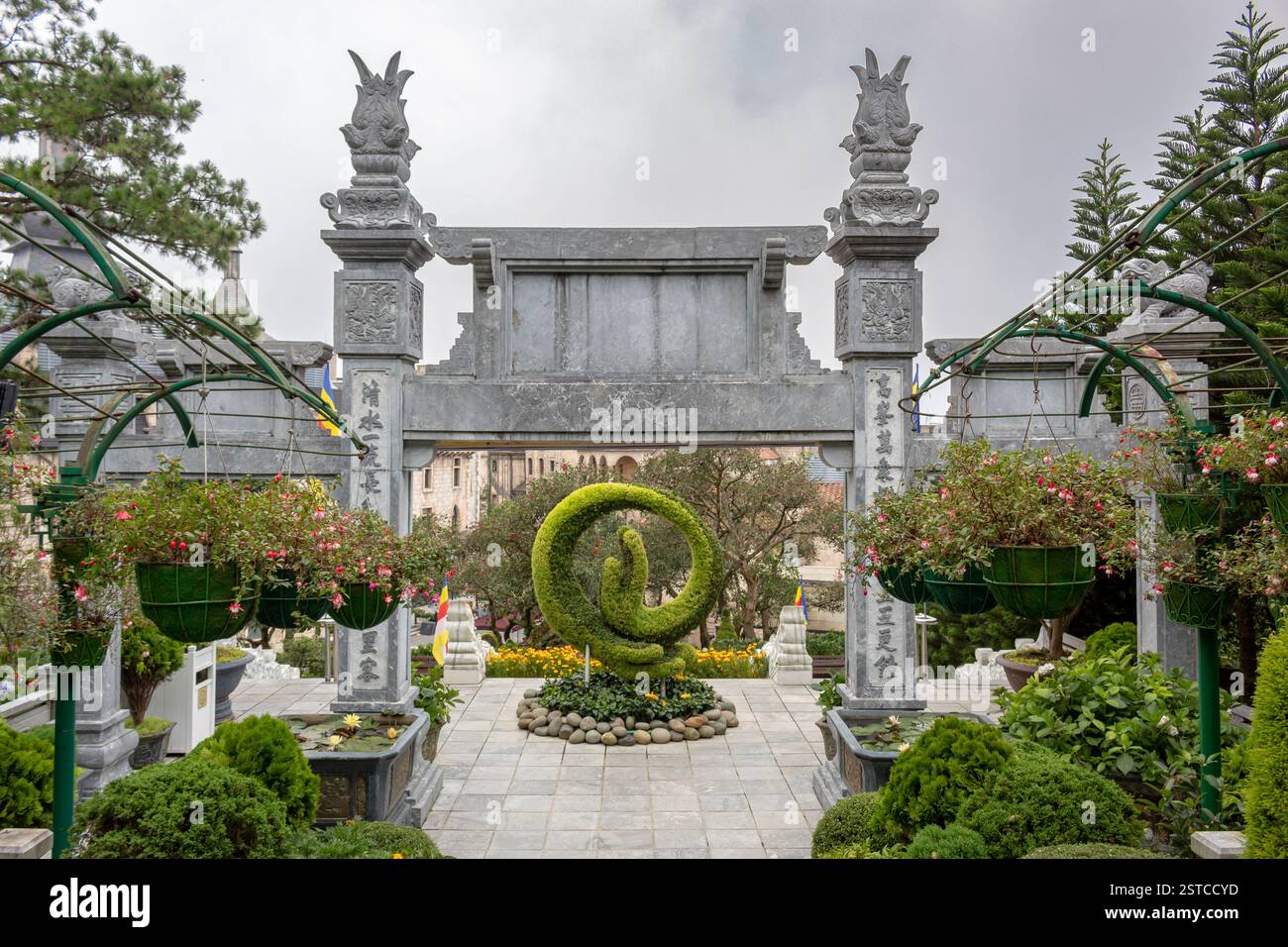 Stone traditional style gate structure at a Buddhist temple garden at ...