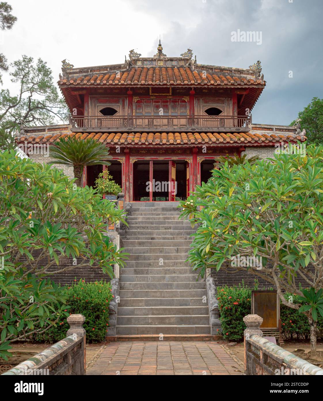 Colorful traditional style building tomb structure surrounded by lush ...