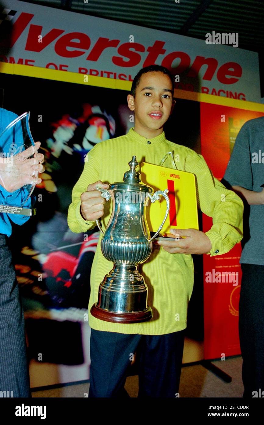 Lewis Hamilton seen here in early 1998 picking up his trophy for his ...