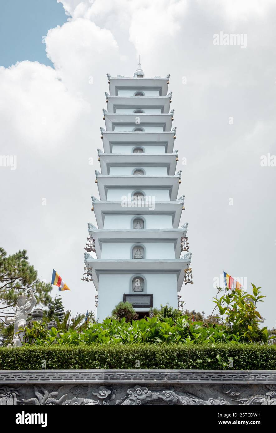 White marble pagoda structure at a Buddhist temple in Ba Na Hills ...