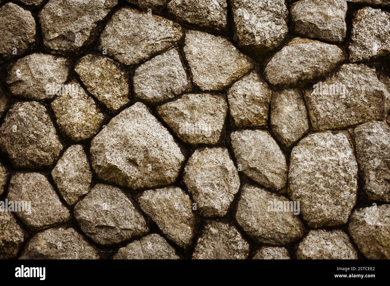 Rough stone masonry background Stock Photo - Alamy