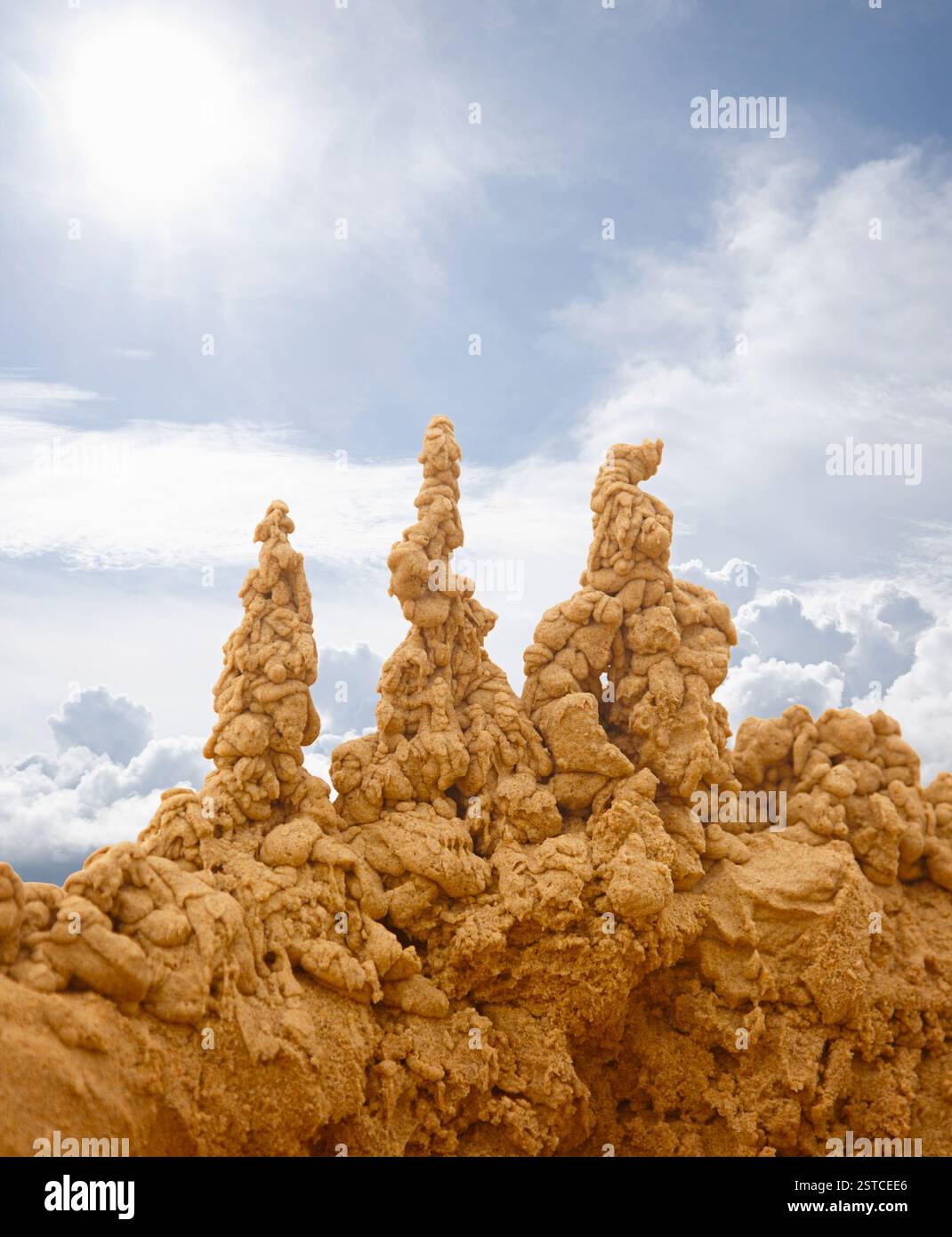 Sand castles on sky background Stock Photo - Alamy