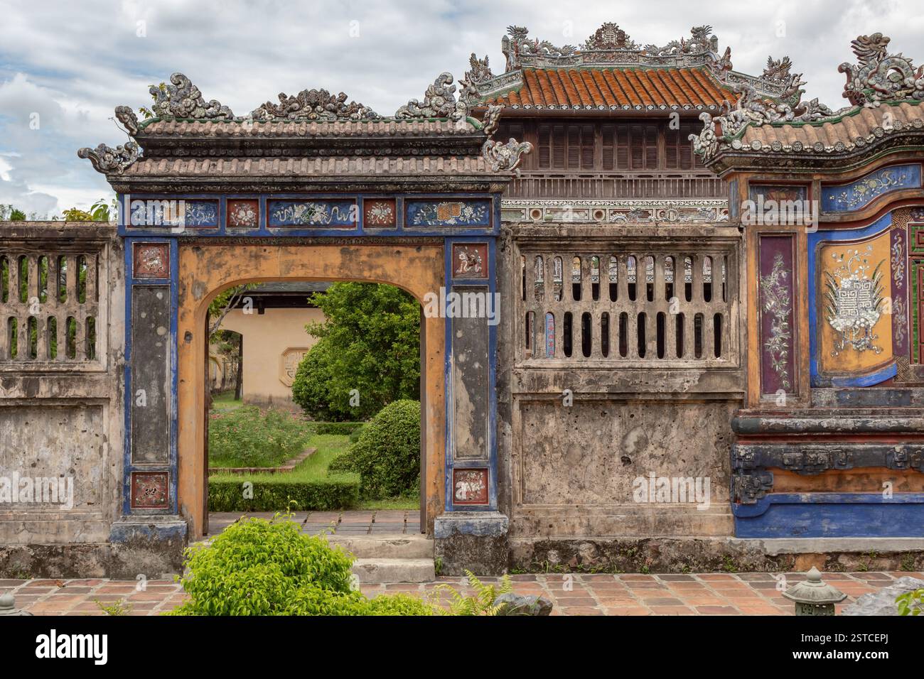 Colorful stone gate and building traditional architecture of the Hue ...