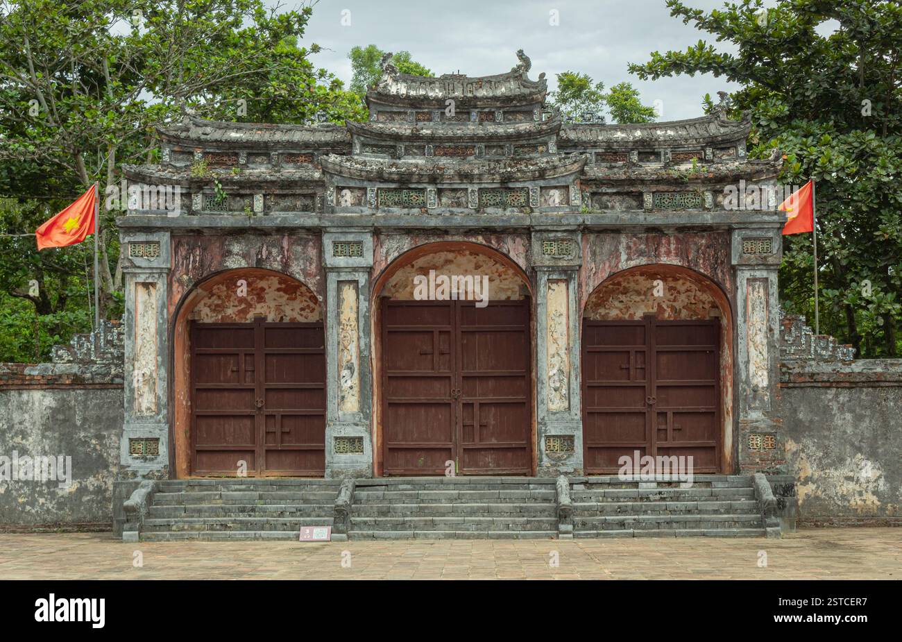 Colorful traditional style stone gate structure at the Mausoleum of ...
