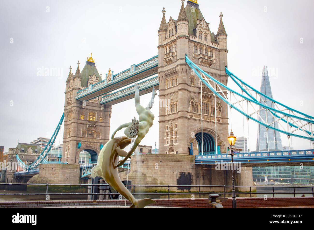 Famous iconic London Tower Bridge structure and dolphin statue. Photo ...