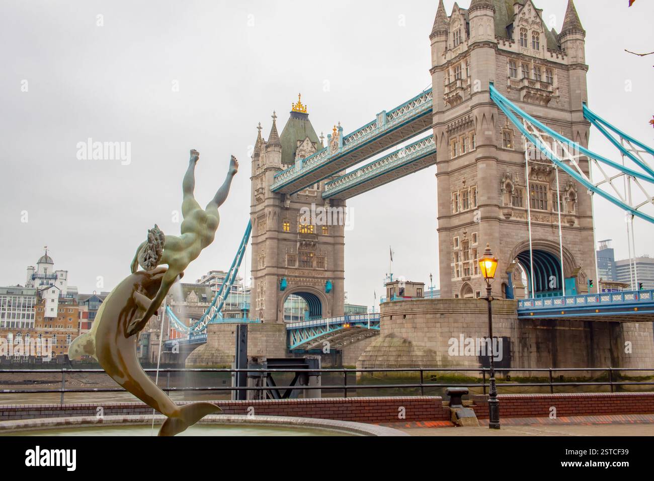 Famous iconic London Tower Bridge structure and dolphin statue. Photo ...