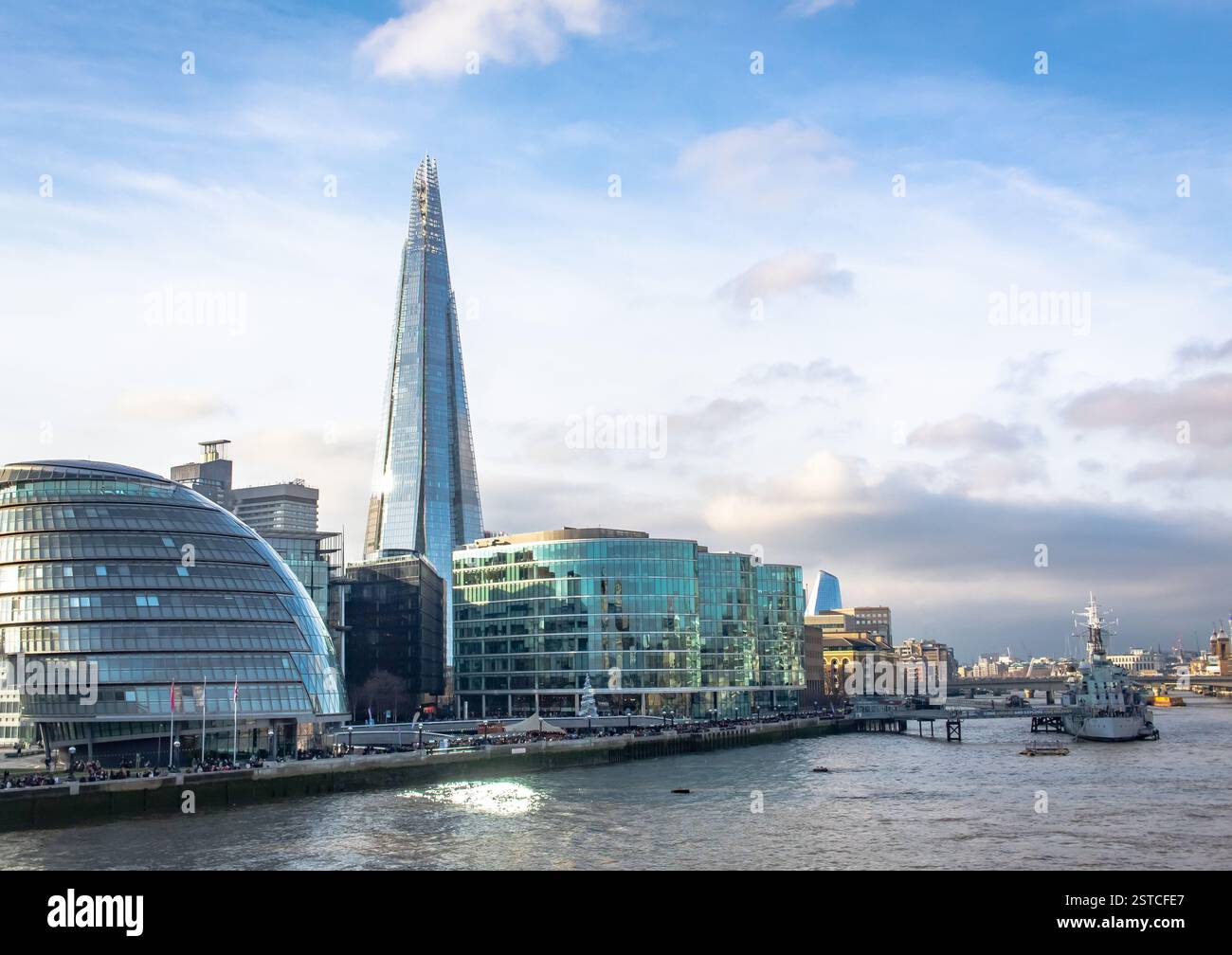 Illuminated buildings of the London United Kingdom city skyline along ...