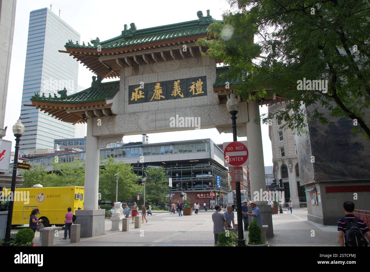 Chinatown Gate is a striking red arch adorned with gold Chinese ...