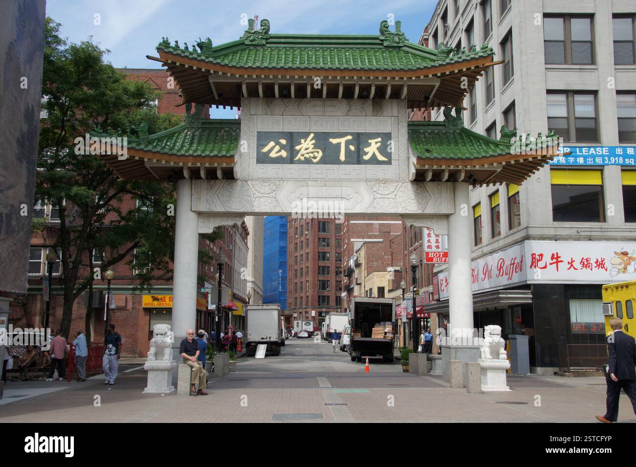 Chinatown Gate is a red archway with gold Chinese characters that read ...