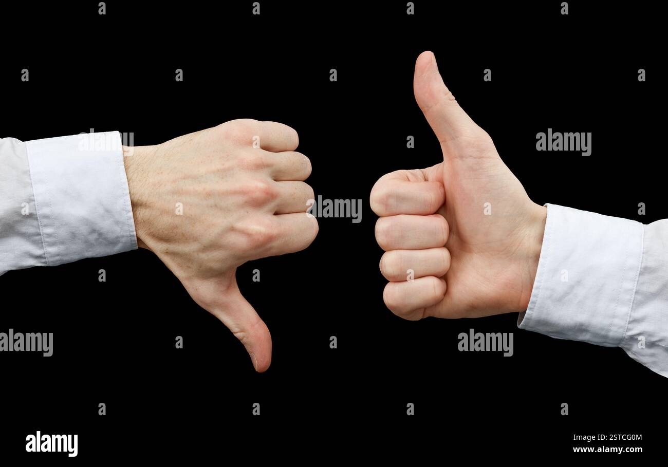 Two hands showing gestures thumb up thumb down Stock Photo - Alamy