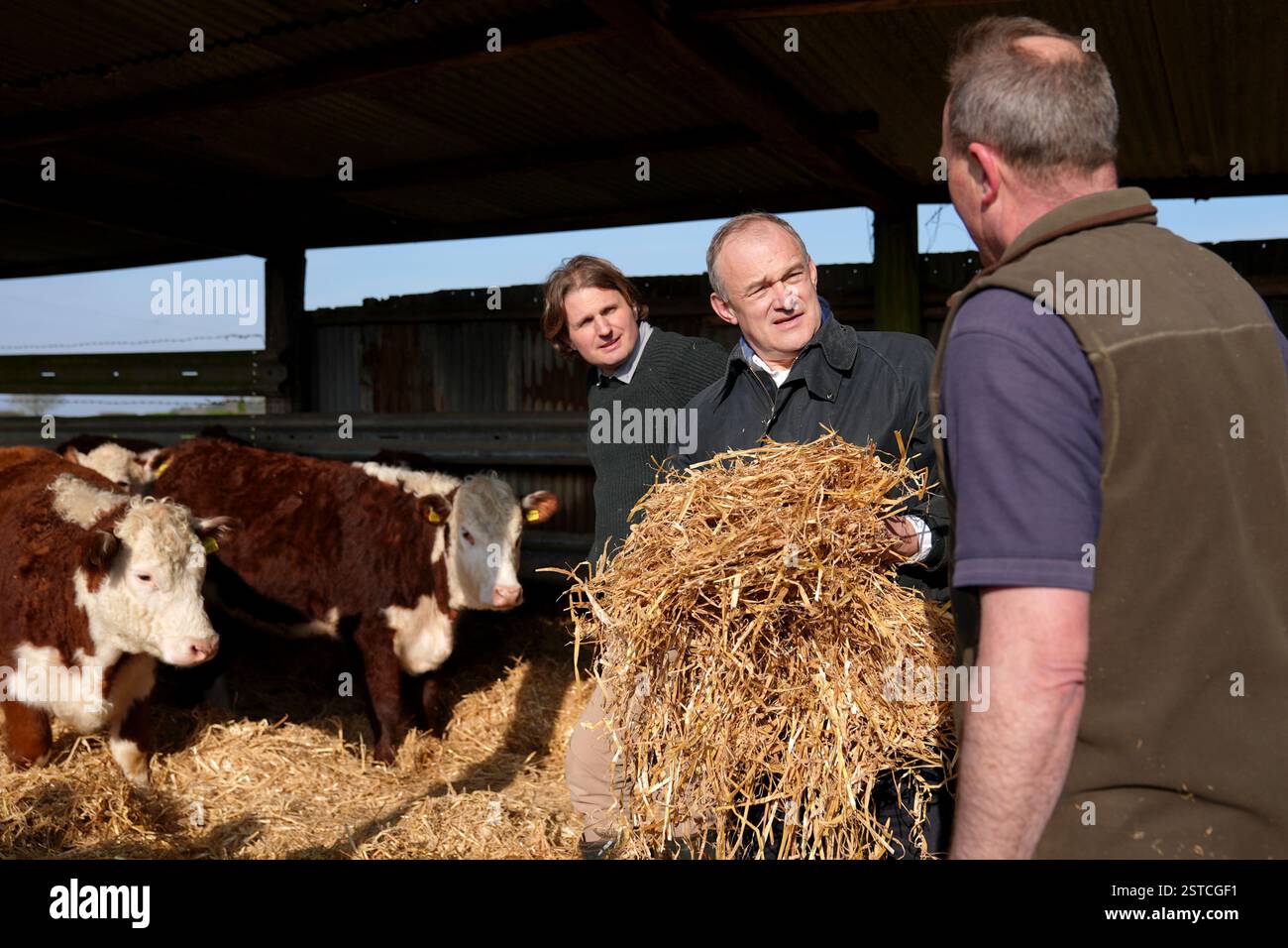 Liberal Democrats leader Sir Ed Davey with farmer Chris Blaxell (right ...