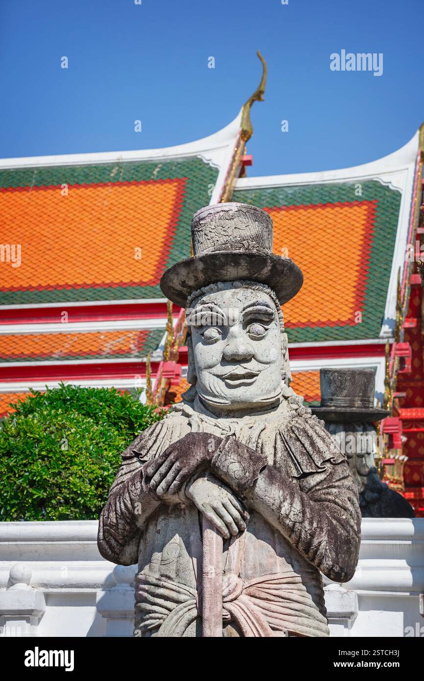Stone gate guard with bowler hat in wat pho temple hi-res stock ...