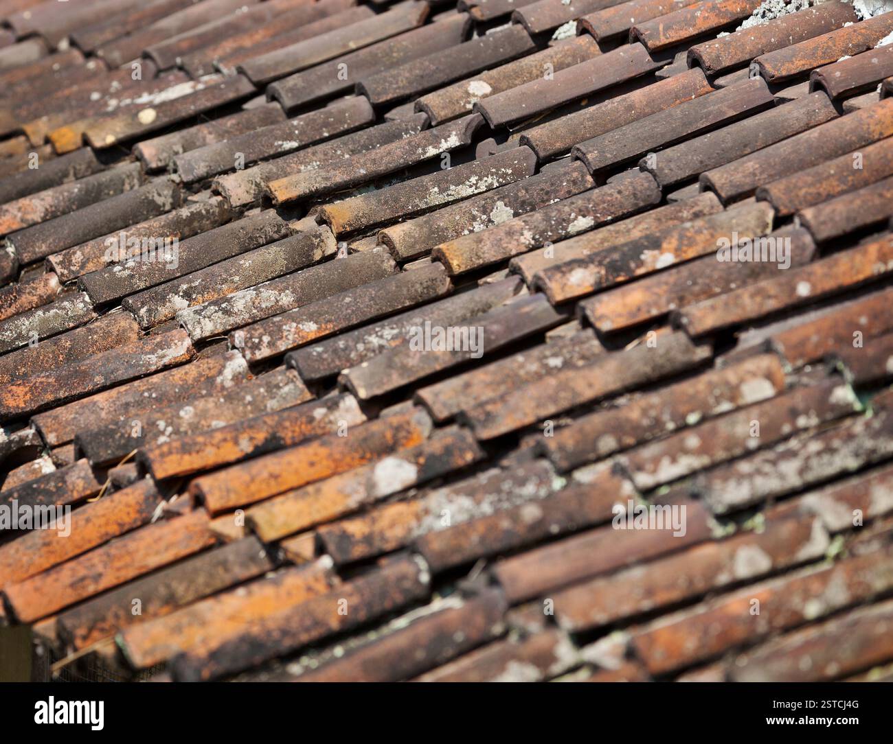 Old red weathered clay tiled roof surface Stock Photo - Alamy