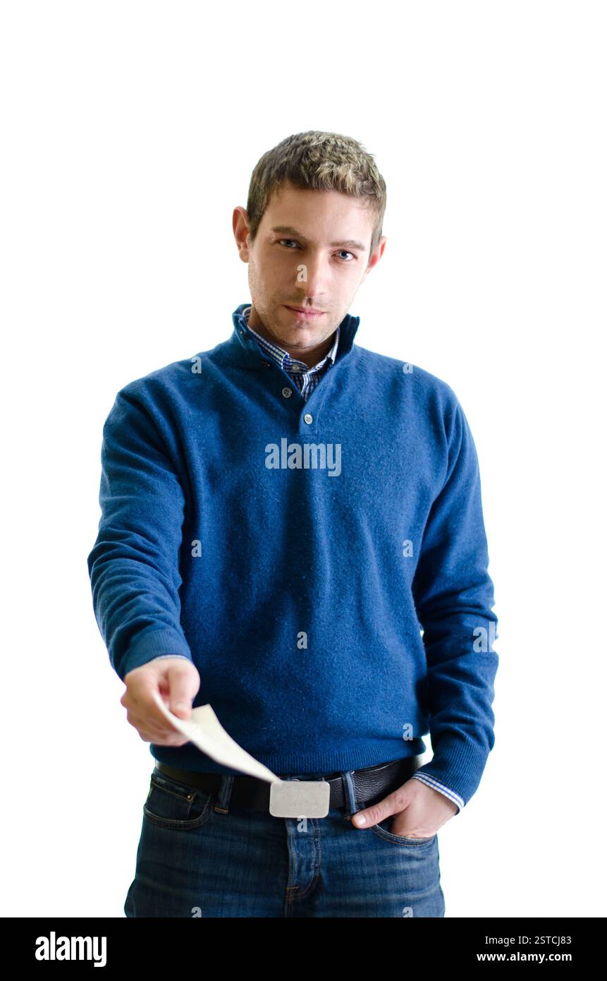 Handsome young man giving or handling sheet of paper Stock Photo - Alamy