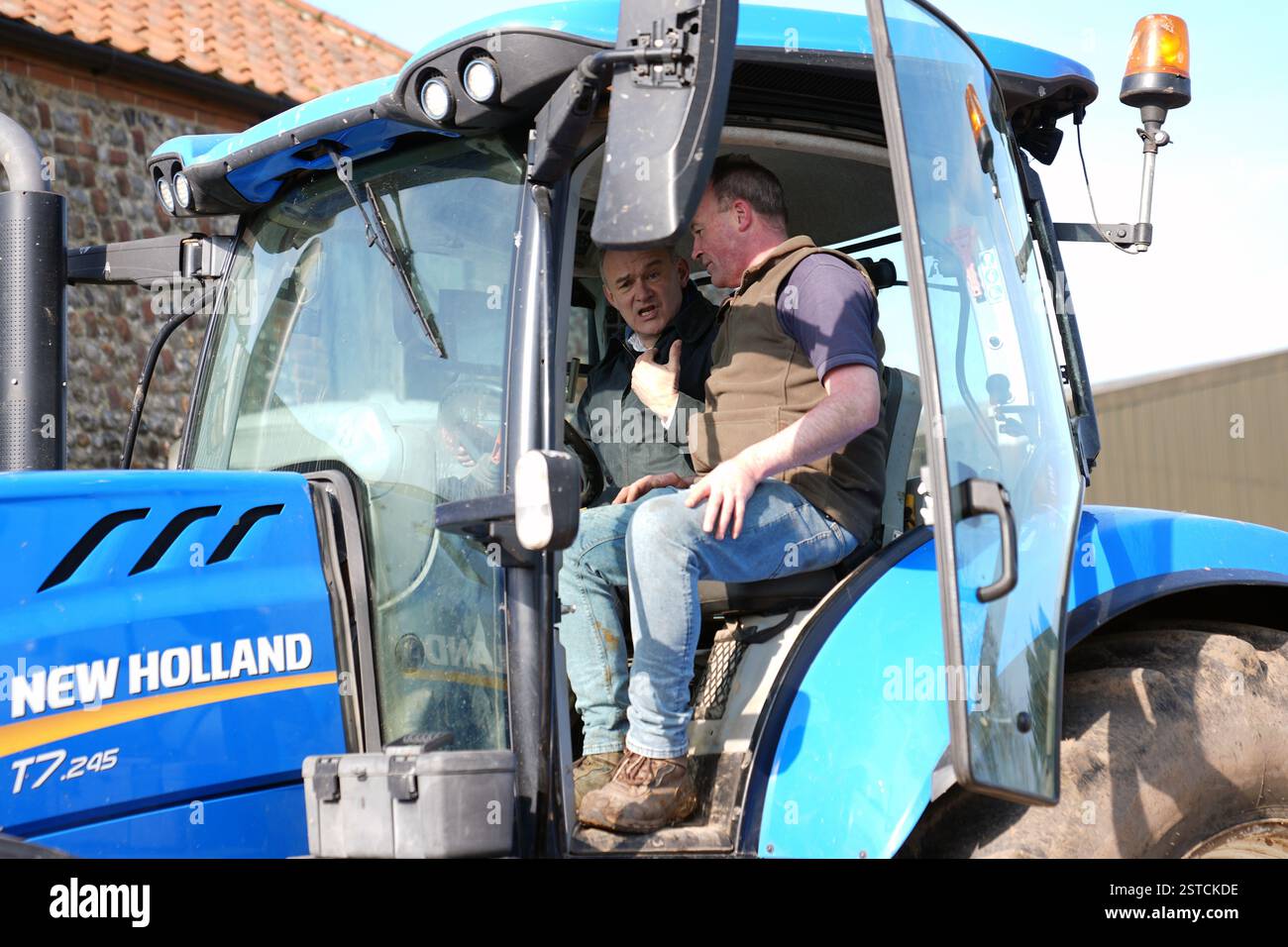 Liberal Democrats leader Sir Ed Davey with farmer Chris Blaxell in the ...