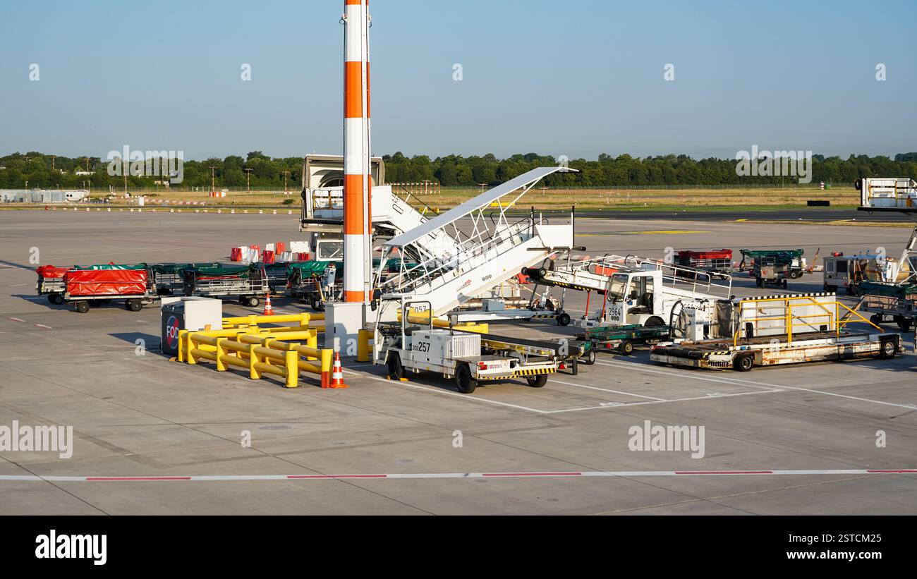 Parking area for vehicles on the tarmac at Duesseldorf Airport. View on ...