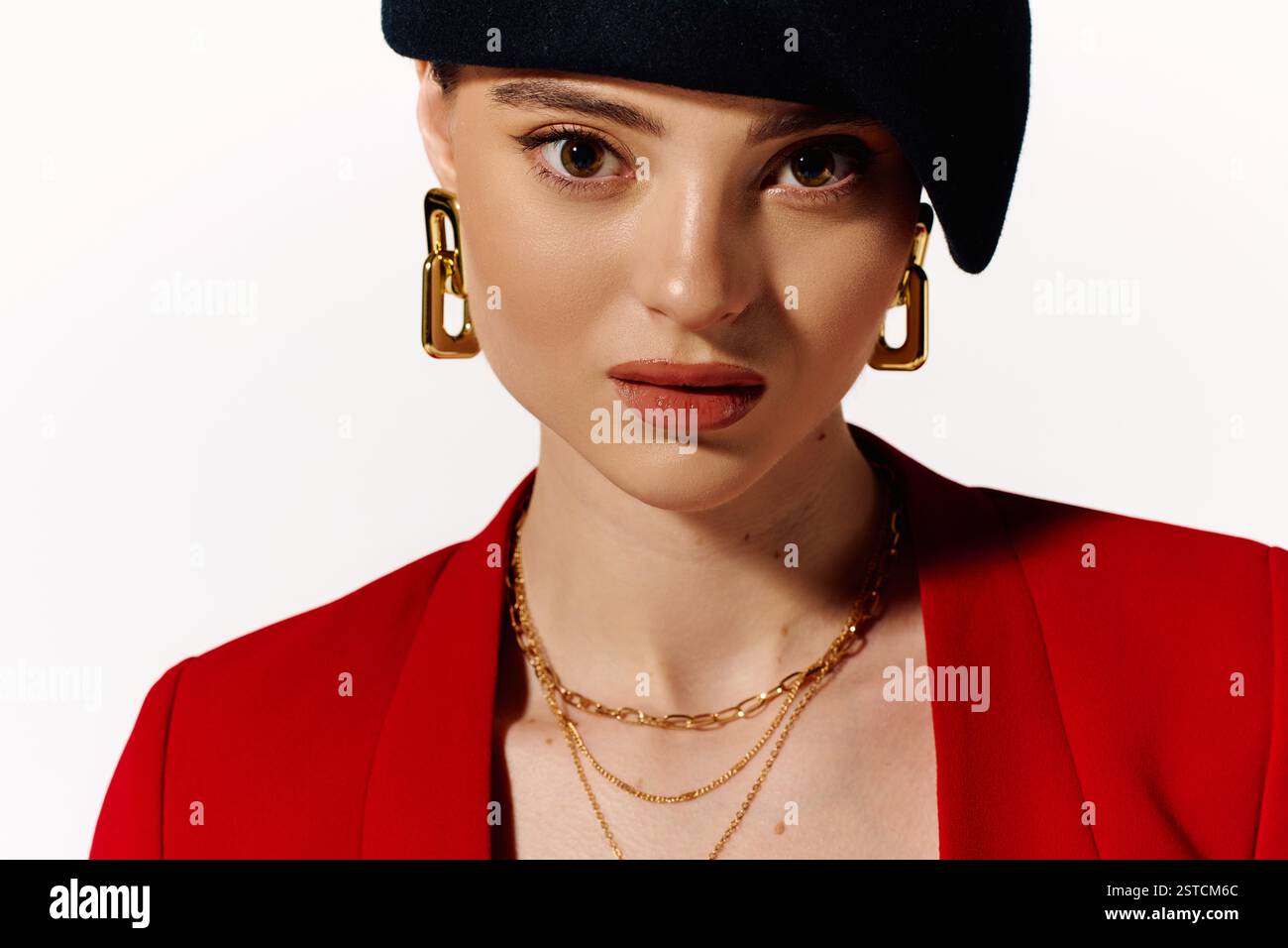 Young woman displays her style with chic jewelry and a trendy outfit in ...