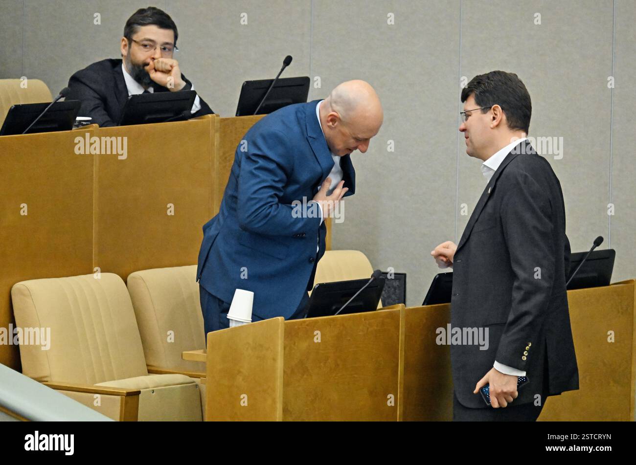 Moscow, Russia. 18th Feb, 2025. From left to right: member of the ...