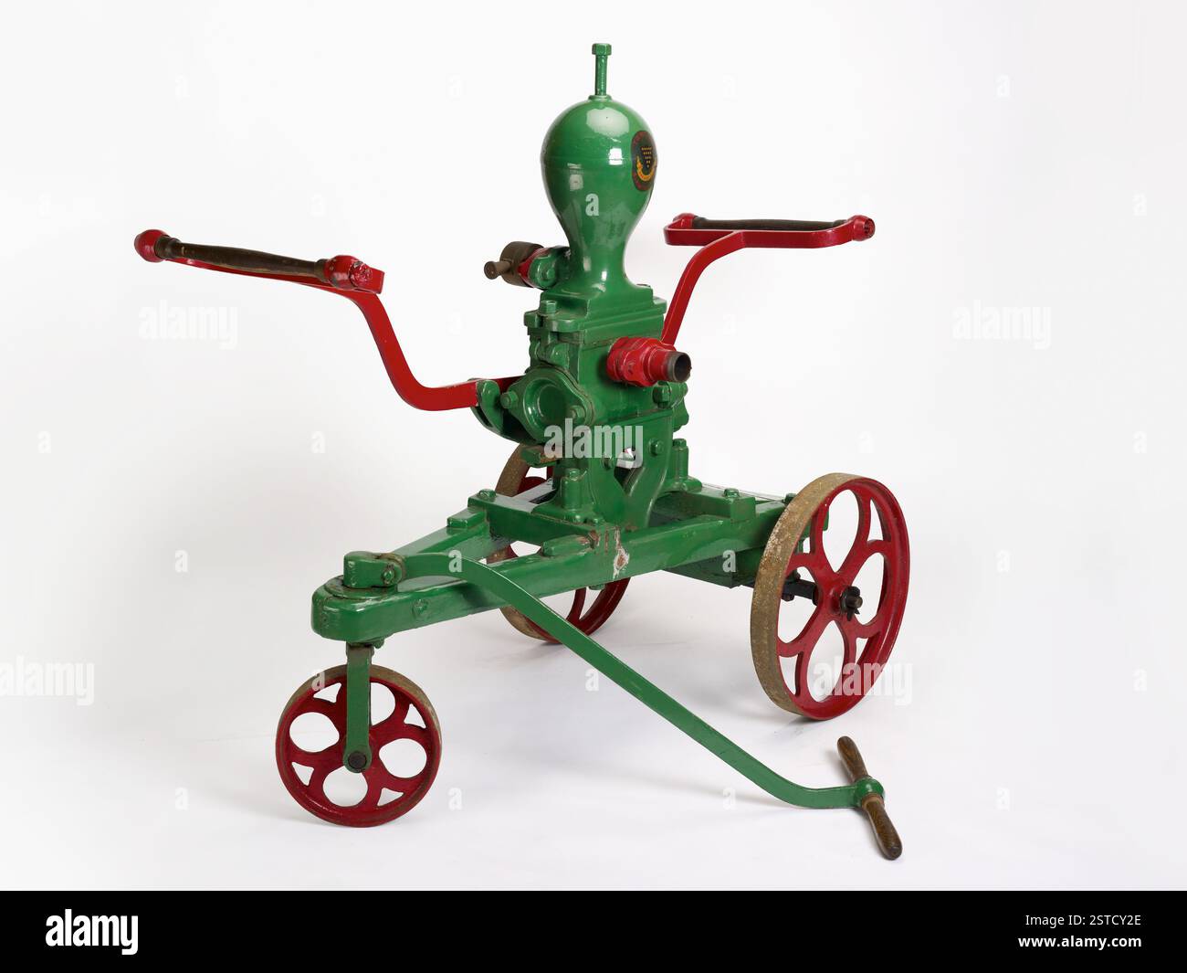 A painted steel fire pump with hose reel manufactured by Tangye of ...
