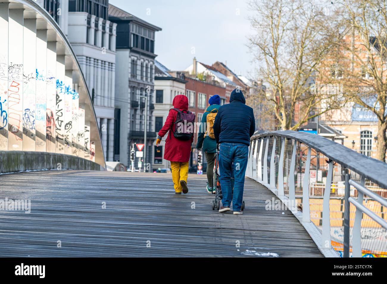 People walking over the Suzan Daniel bridge in Molenbeek, Brussels ...