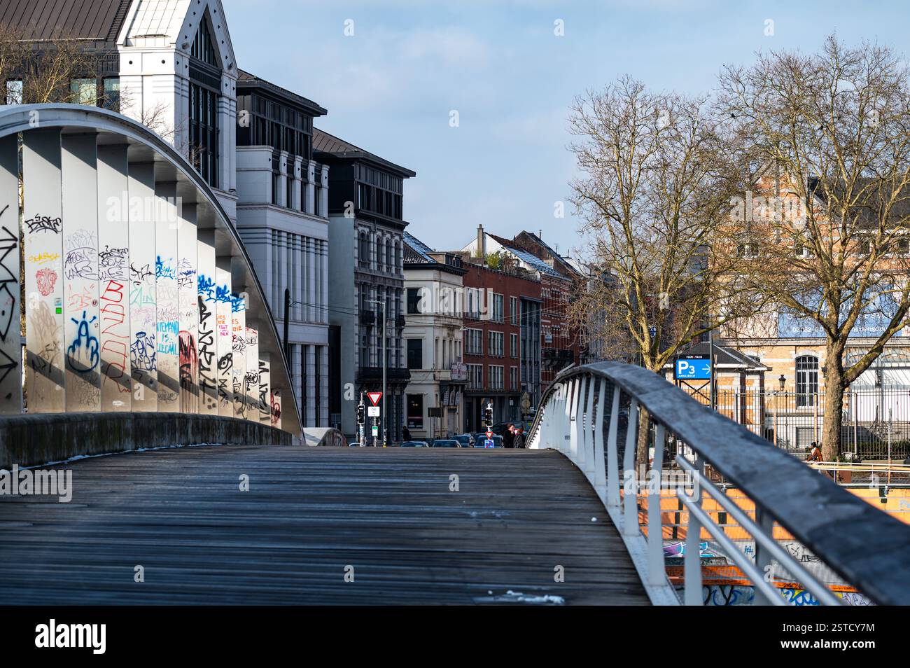 People walking over the Suzan Daniel bridge in Molenbeek, Brussels ...