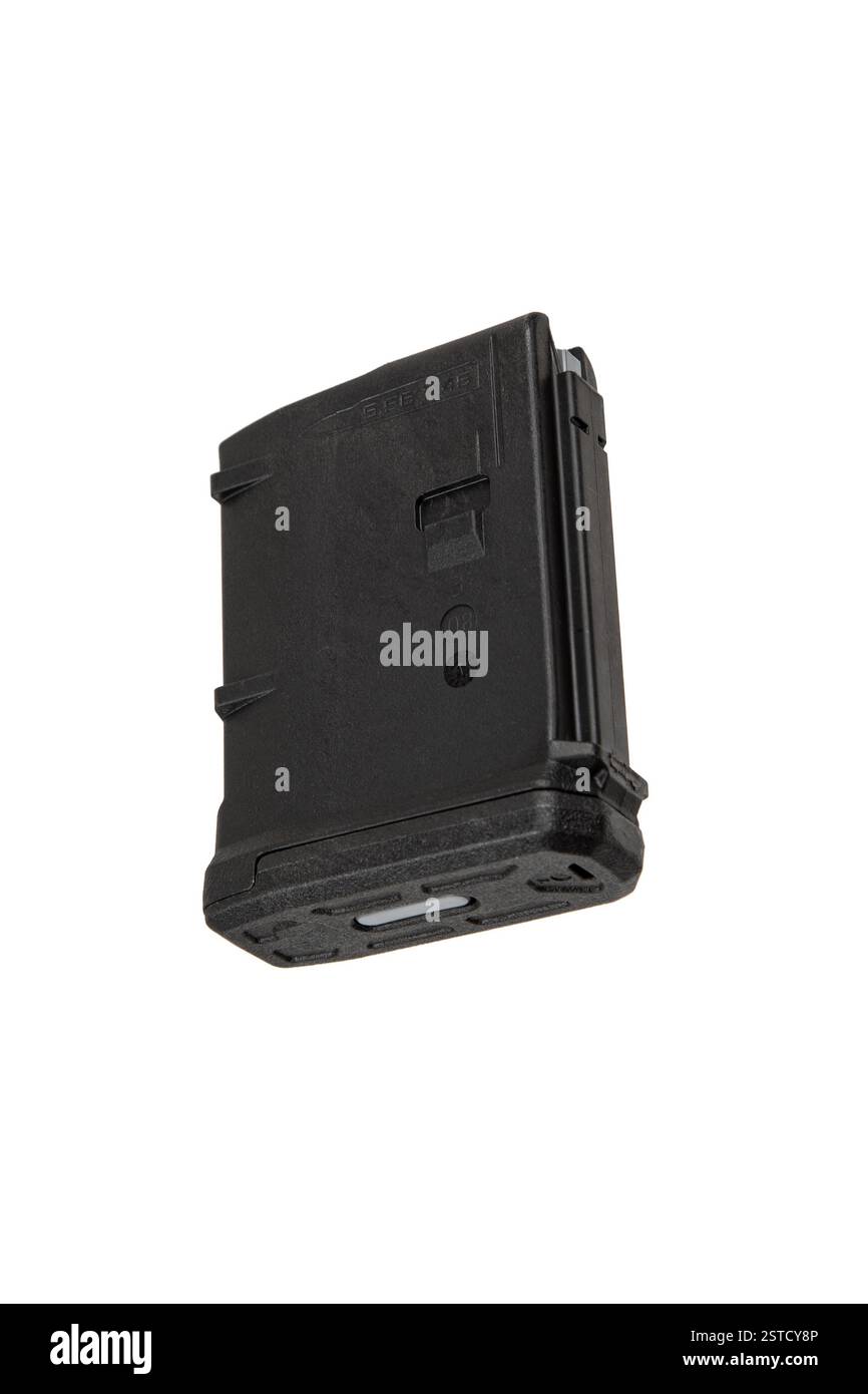 A black polymer magazine for a 5.56 NATO rifle, compact and durable ...