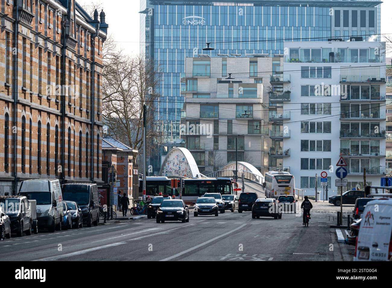 Mixed traffic with cars, busses, pedestrians and bikes at the rue ...
