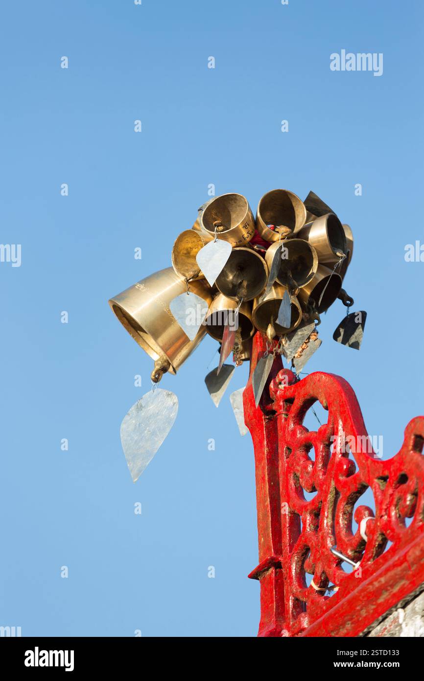 Myanmar, Kyaiktiyo Pagoda, prayer bells at the Golden Rock shrine. The ...