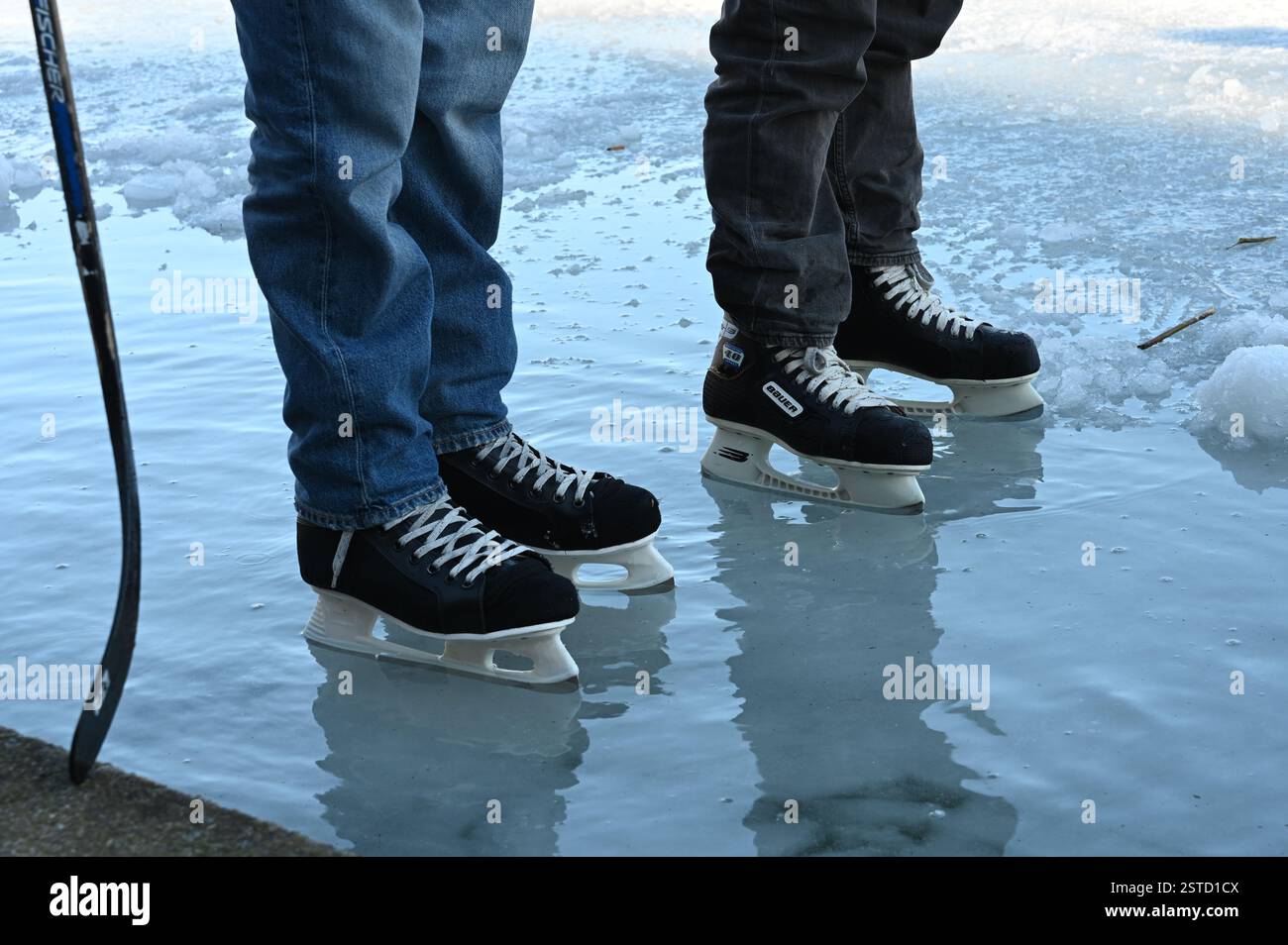 Berlin, Germany. 18th Feb, 2025. Two skaters stand at the edge of the ...