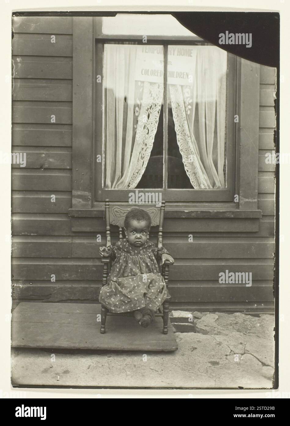 A 1906 photograph showing a domestic scene in Pittsburgh. The image ...