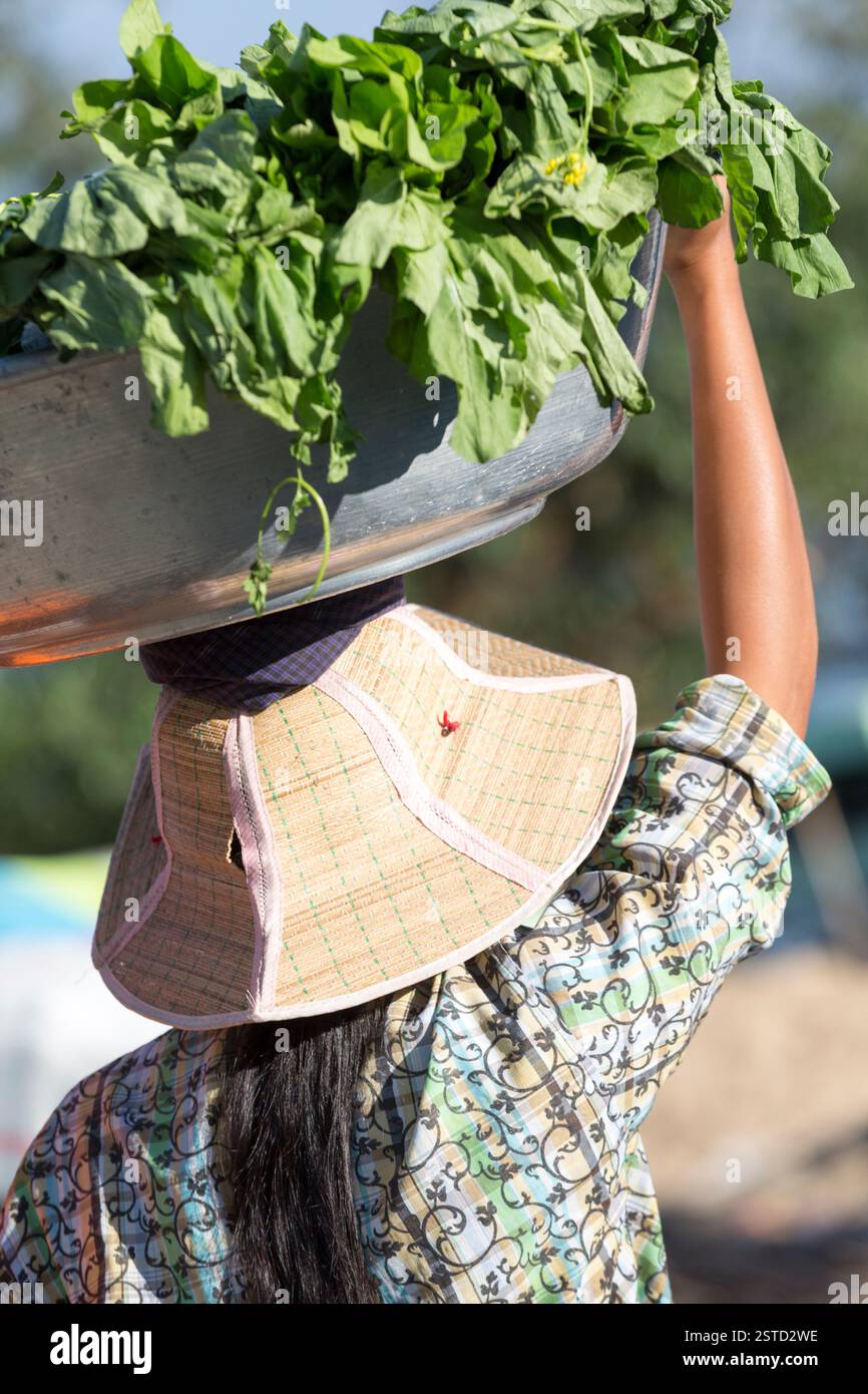 Myanmar, Kyaiktiyo Pagoda, Porters carrying goods to the Golden rock ...