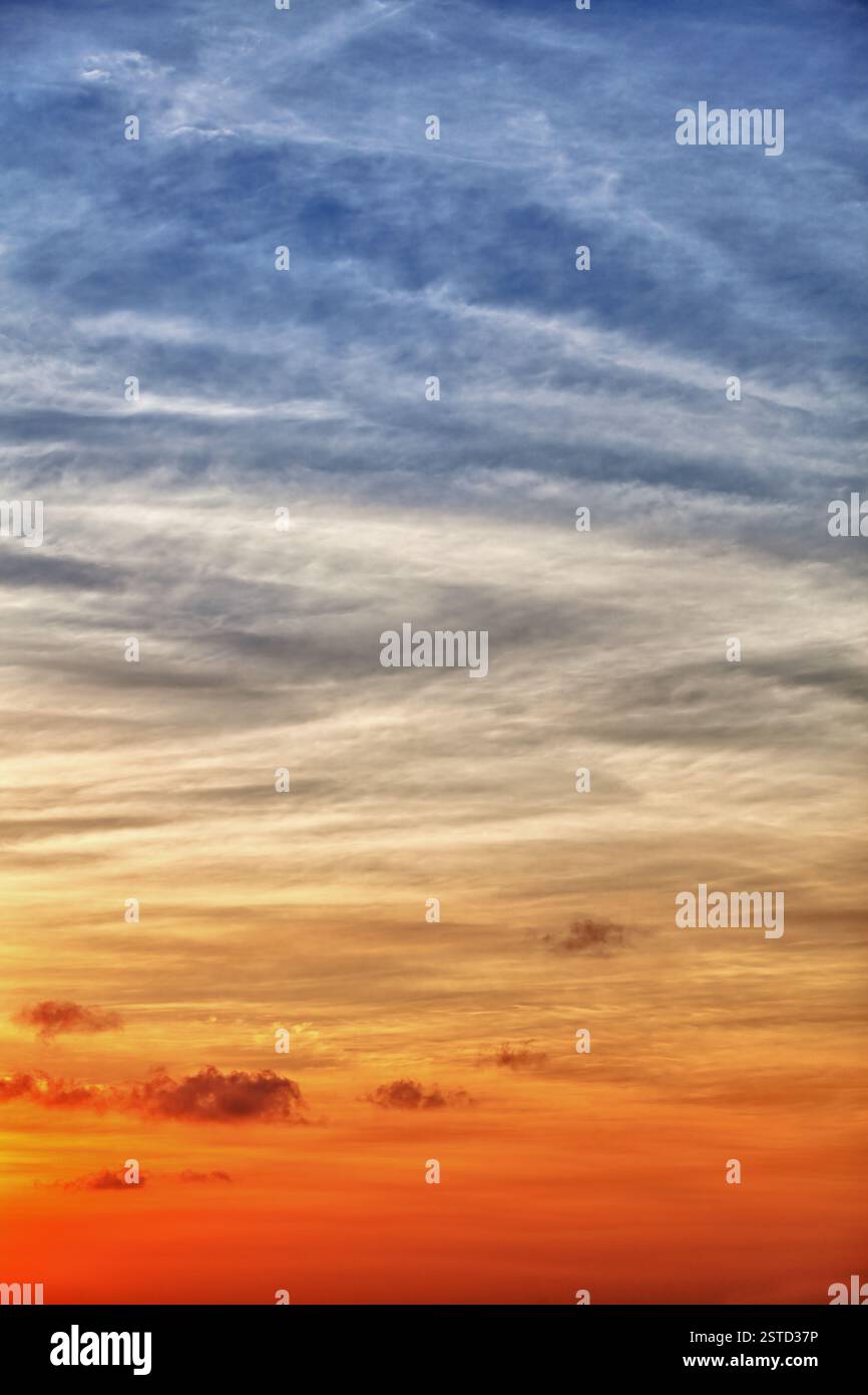Vertical sky background with gradient from blue to orange Stock Photo ...