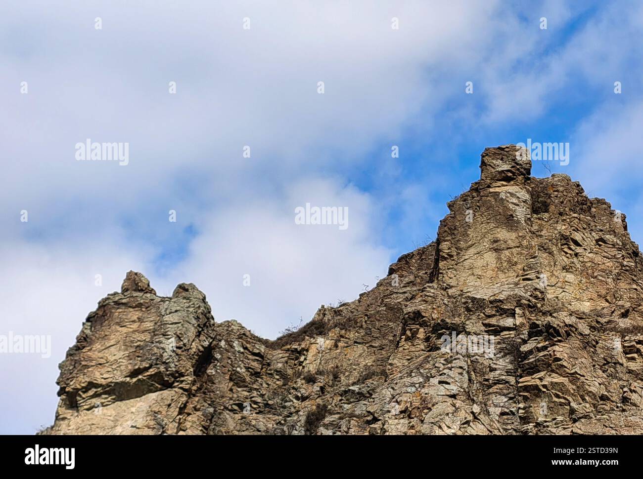 Ancient Fortress Cliffs Under Cloudy Sky Stock Photo - Alamy