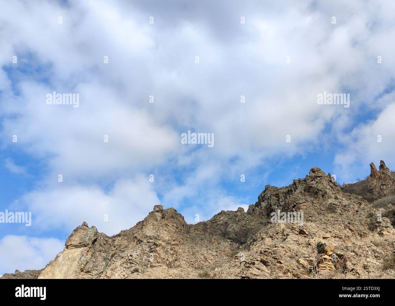 Ancient Fortress Cliffs Under Cloudy Sky Stock Photo - Alamy