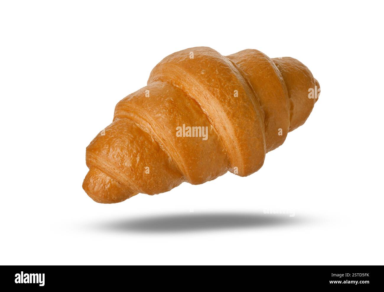 Delicious croissant falling on white background. Puff pastry Stock ...