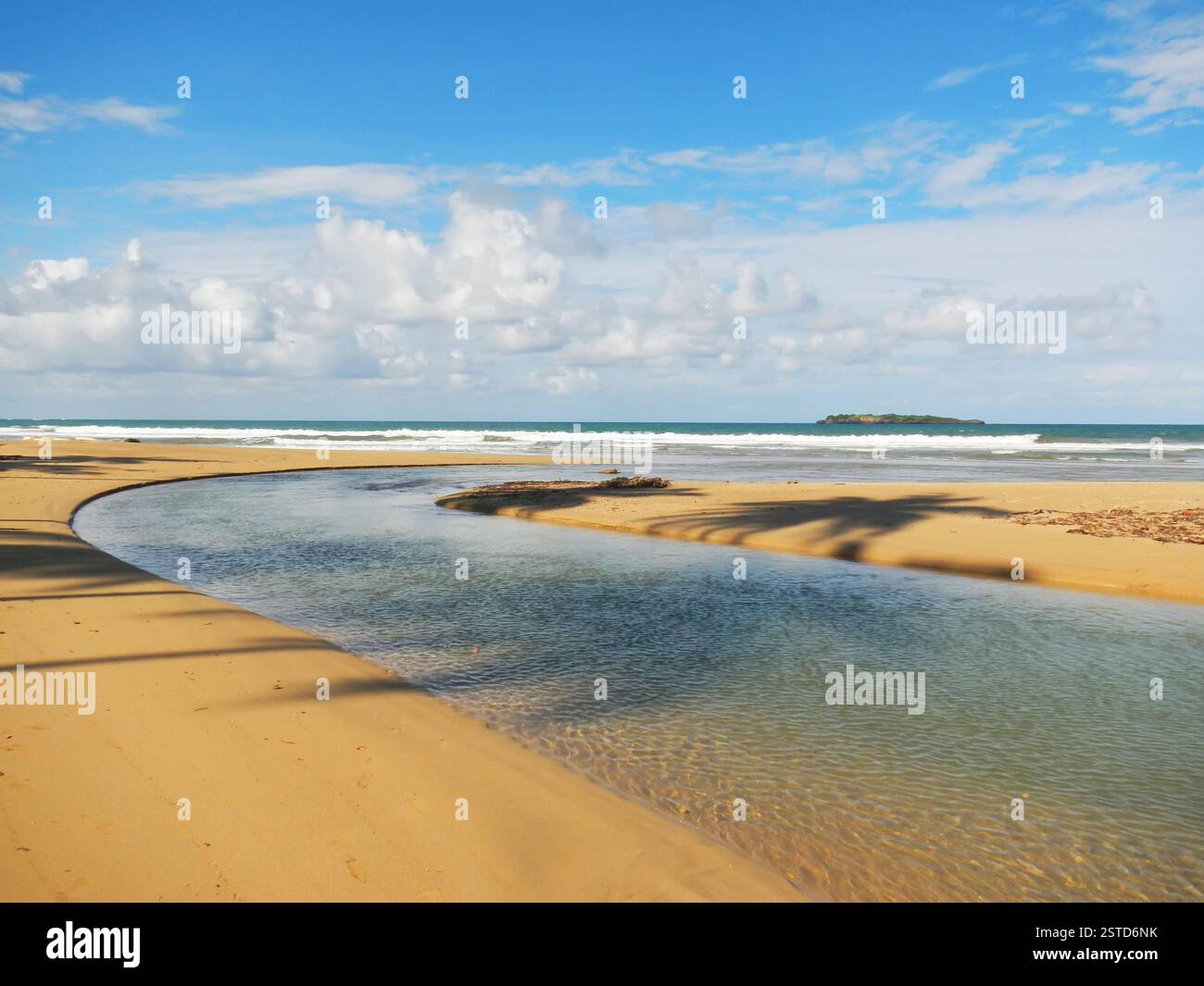Freshwater river on a beach Stock Photo - Alamy